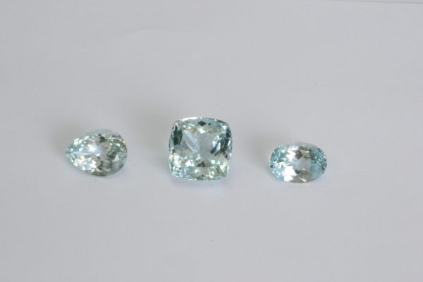 Natural white, light blue, imperial topaz