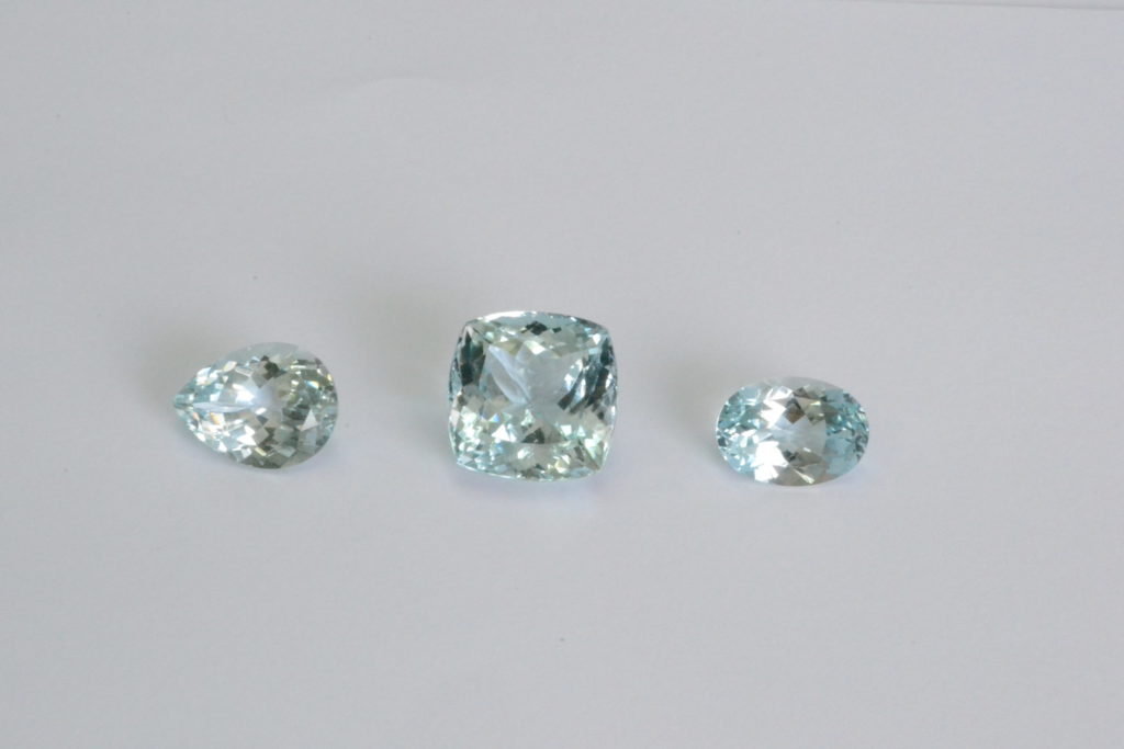 Natural white, light blue, imperial topaz